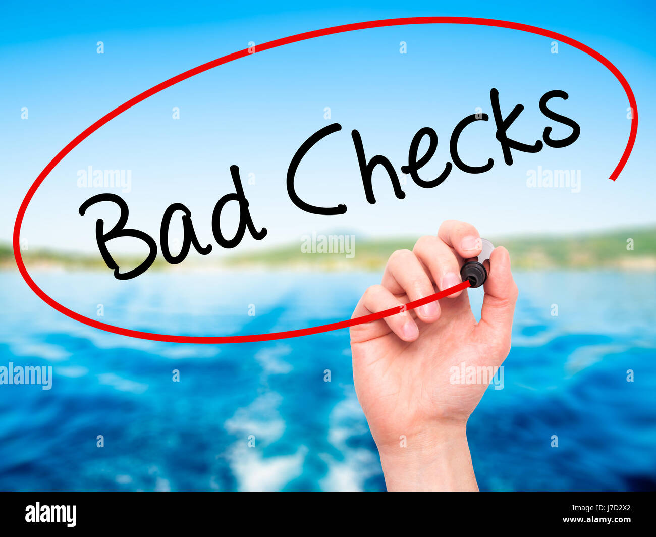 Man Hand writing Bad Checks with black marker on visual screen ...