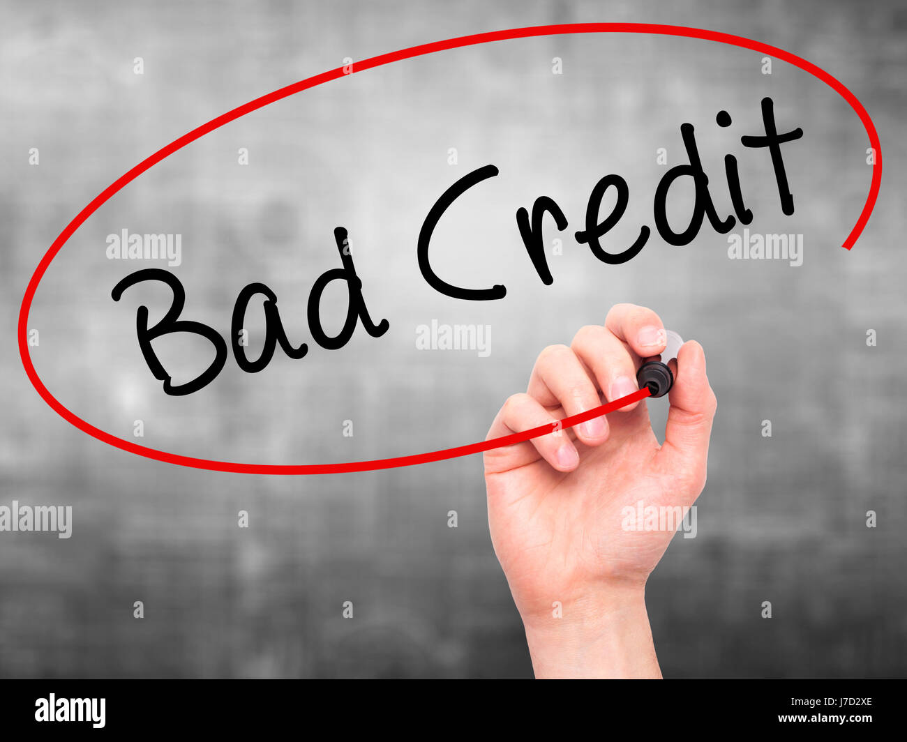 Man Hand writing Bad Credit with black marker on visual screen ...