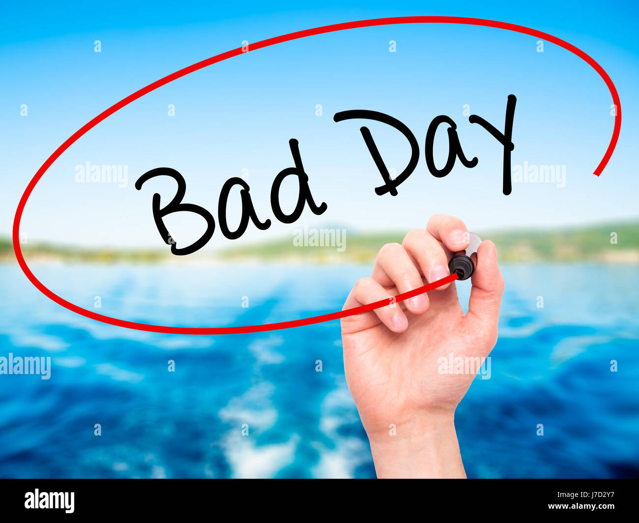 Man Hand writing Bad Day with black marker on visual screen. Isolated ...