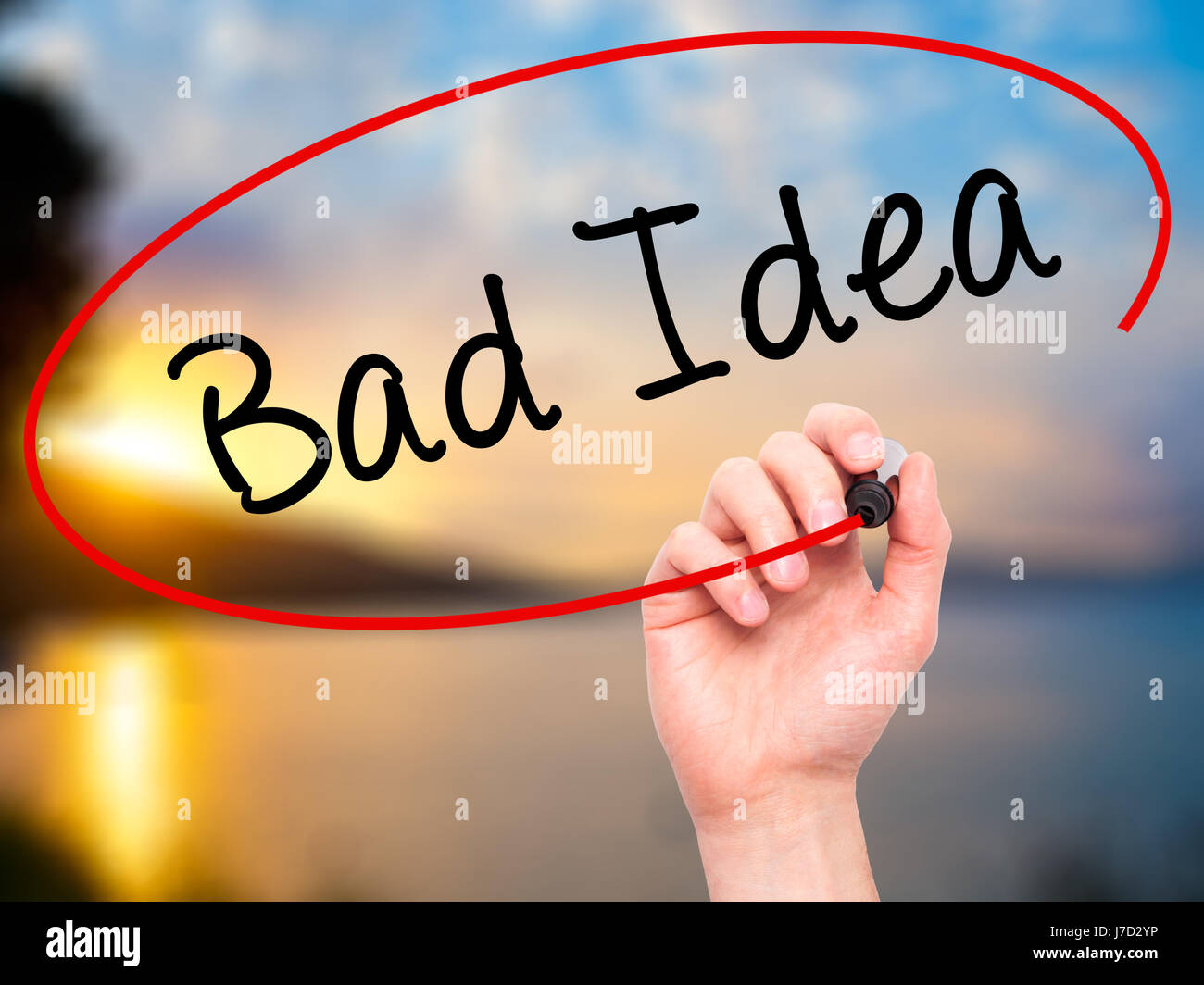 Man Hand writing Bad Idea with black marker on visual screen. Isolated ...