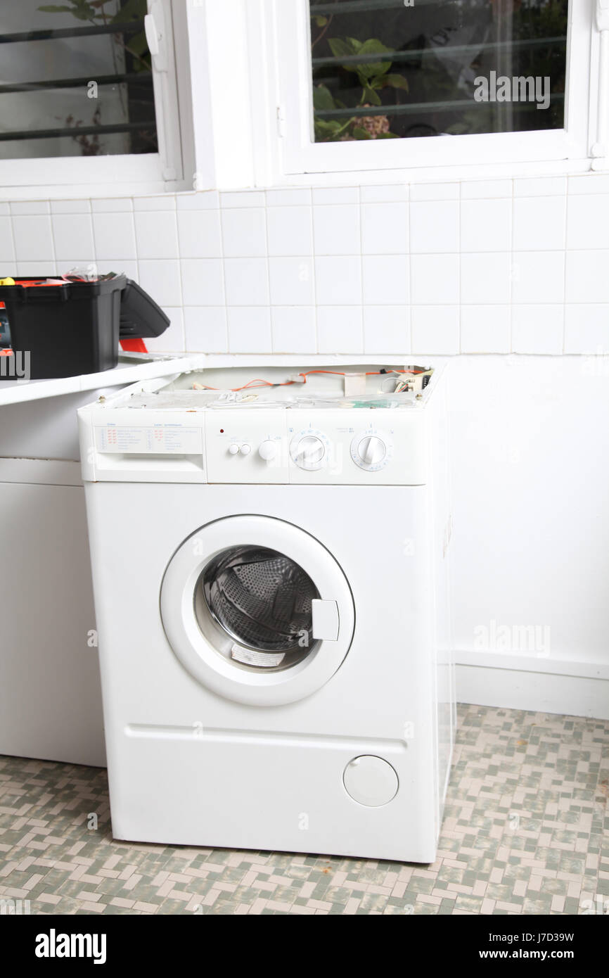 closeup window porthole dormer window pane room washing machine laundry ...