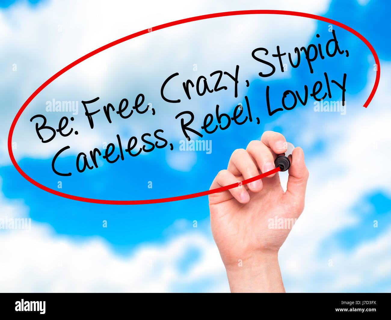 Man Hand writing Be: Free, Crazy, Stupid, Careless, Rebel, Lovely with ...