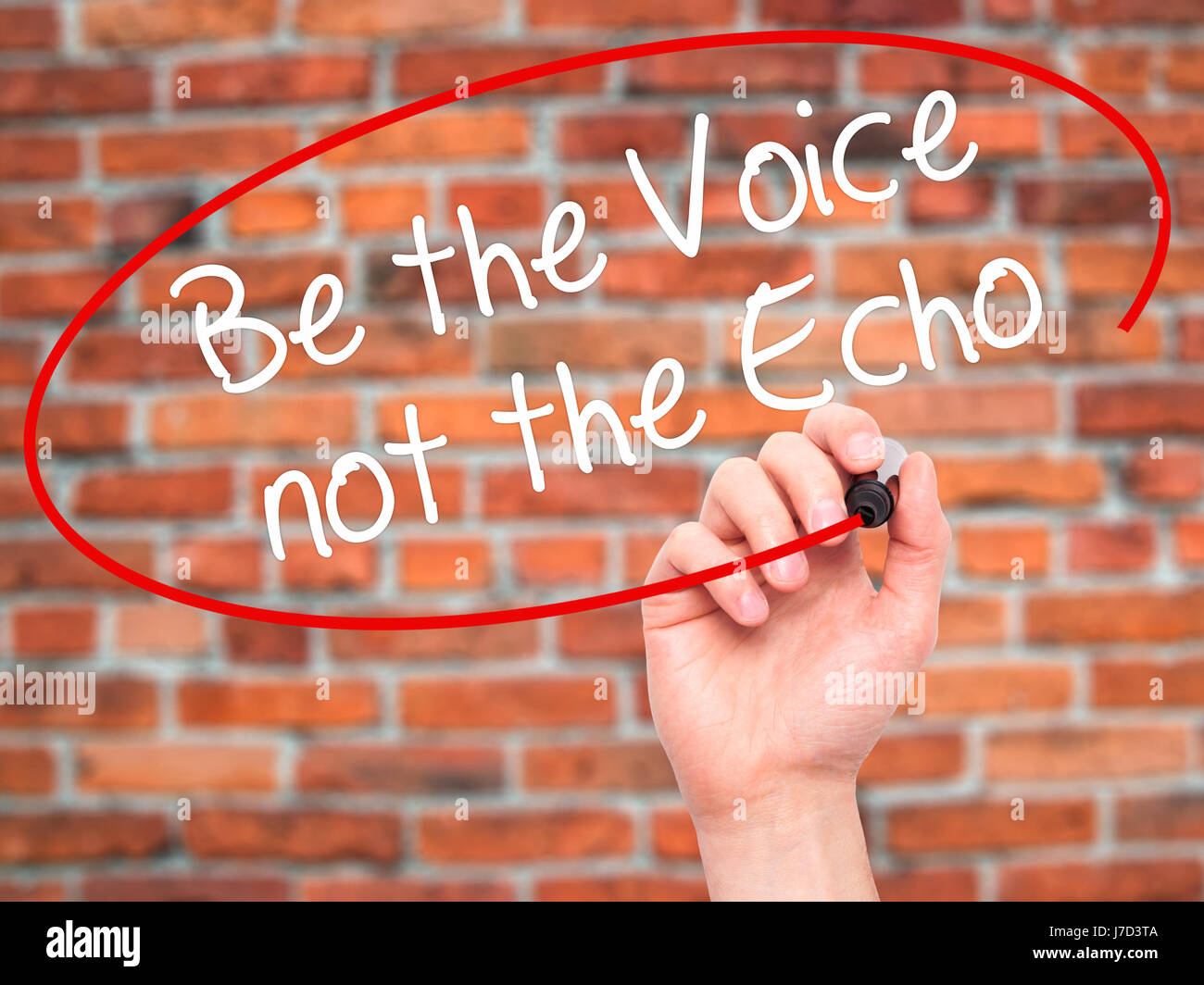 Man Hand writing Be the Voice not the Echo with black marker on visual ...