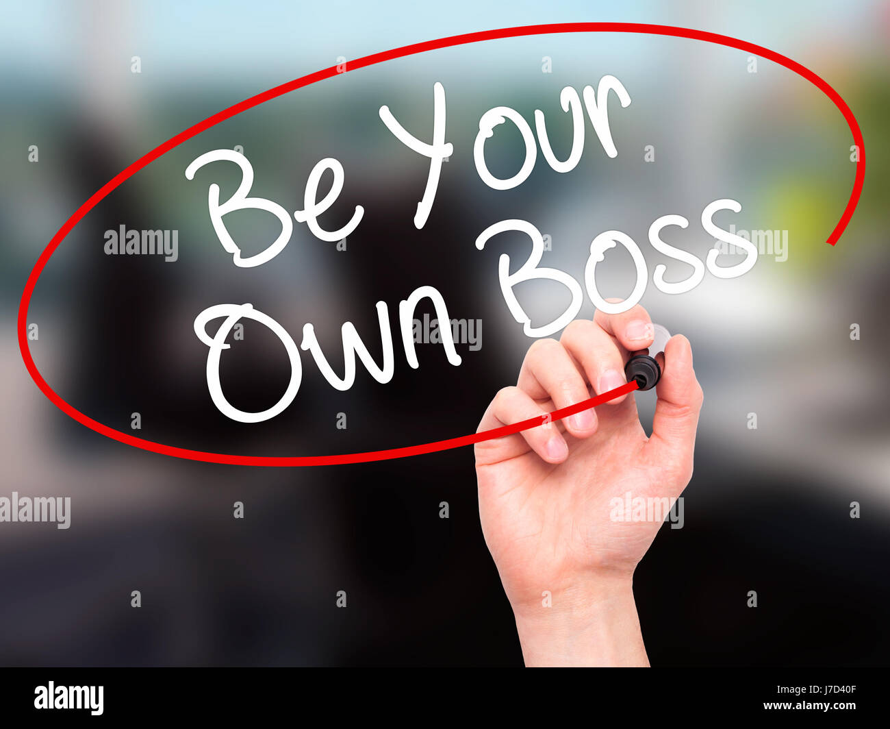 Man Hand writing Be Your Own Boss with black marker on visual screen ...