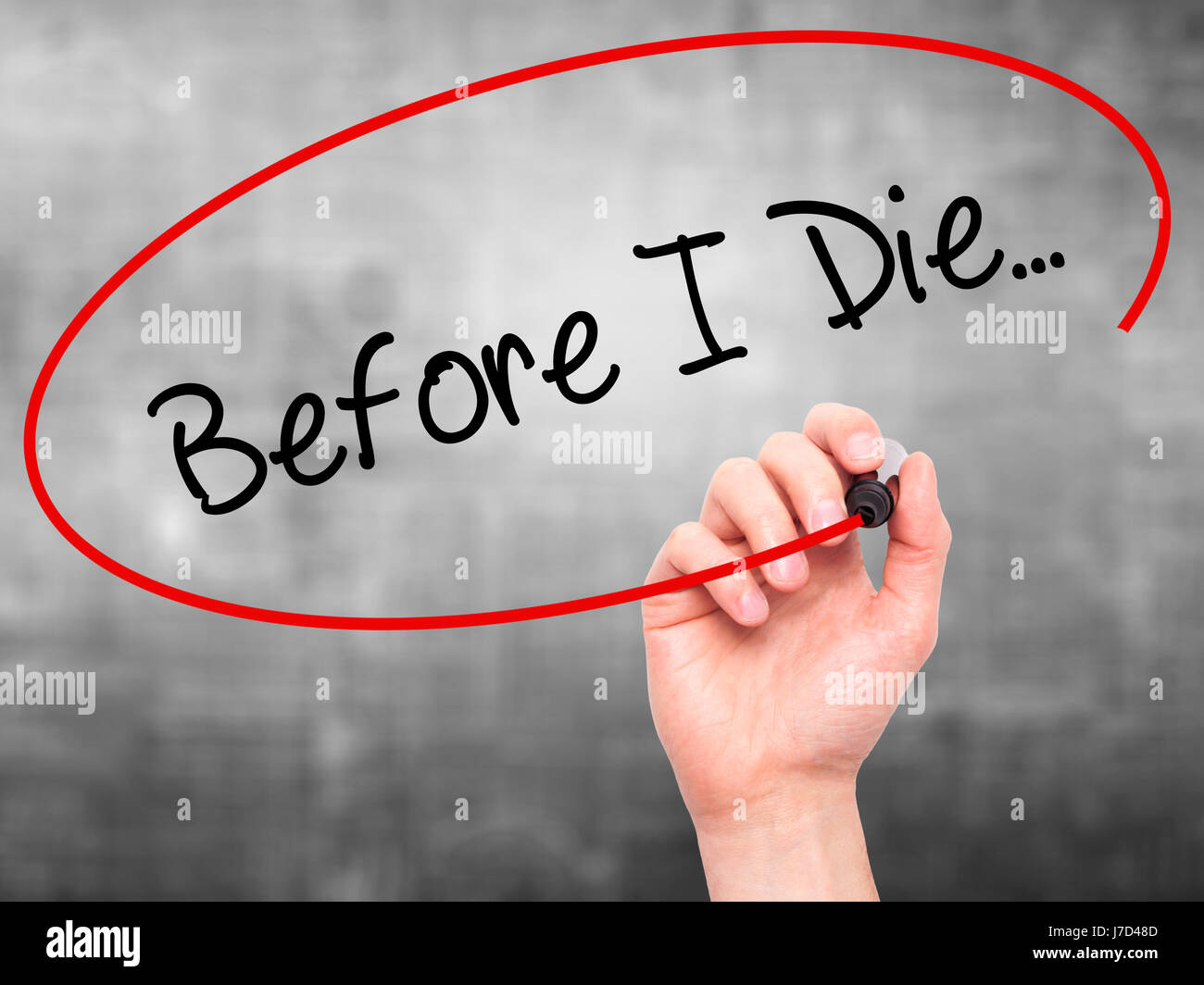 Man Hand writing Before I Die... with black marker on visual screen ...