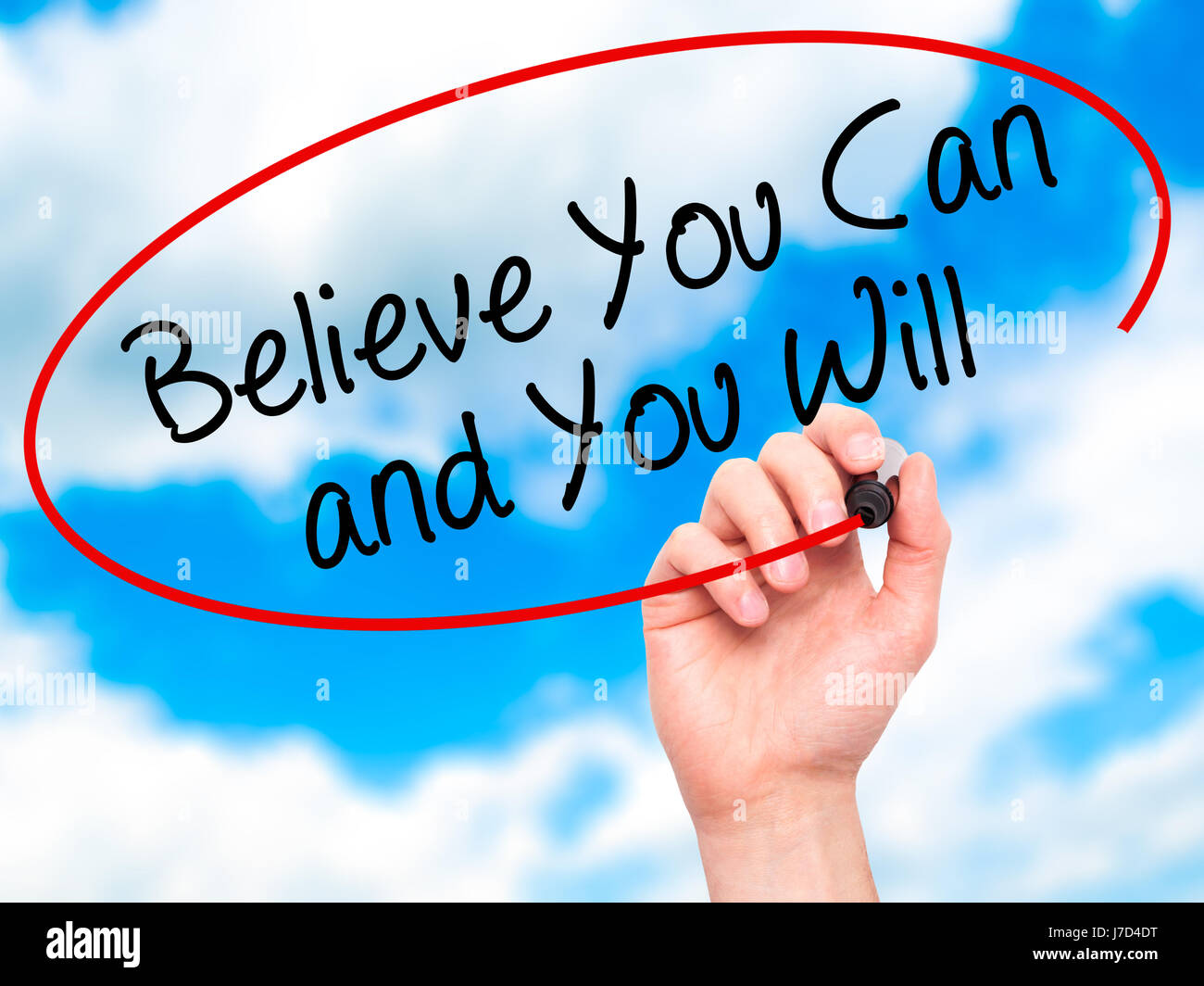 Man Hand writing Believe You Can and You Will with black marker on ...