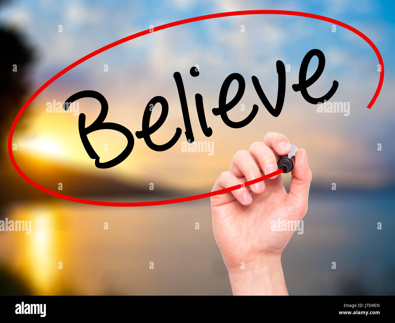 Man Hand writing Believe with black marker on visual screen. Isolated ...