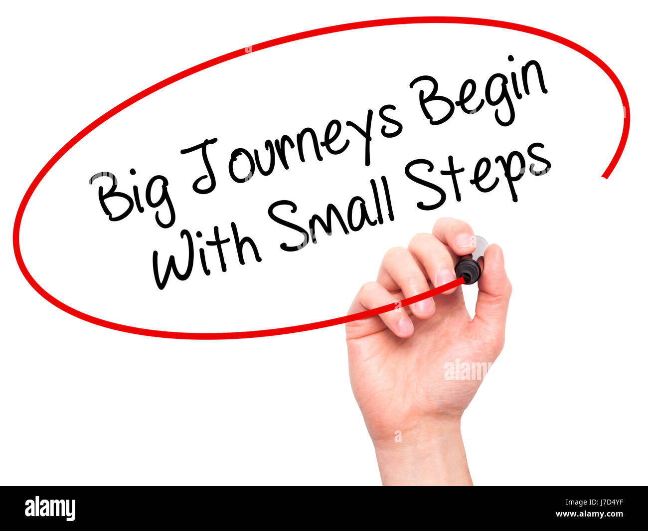 Man Hand writing Big Journeys Begin With Small Steps with black marker ...