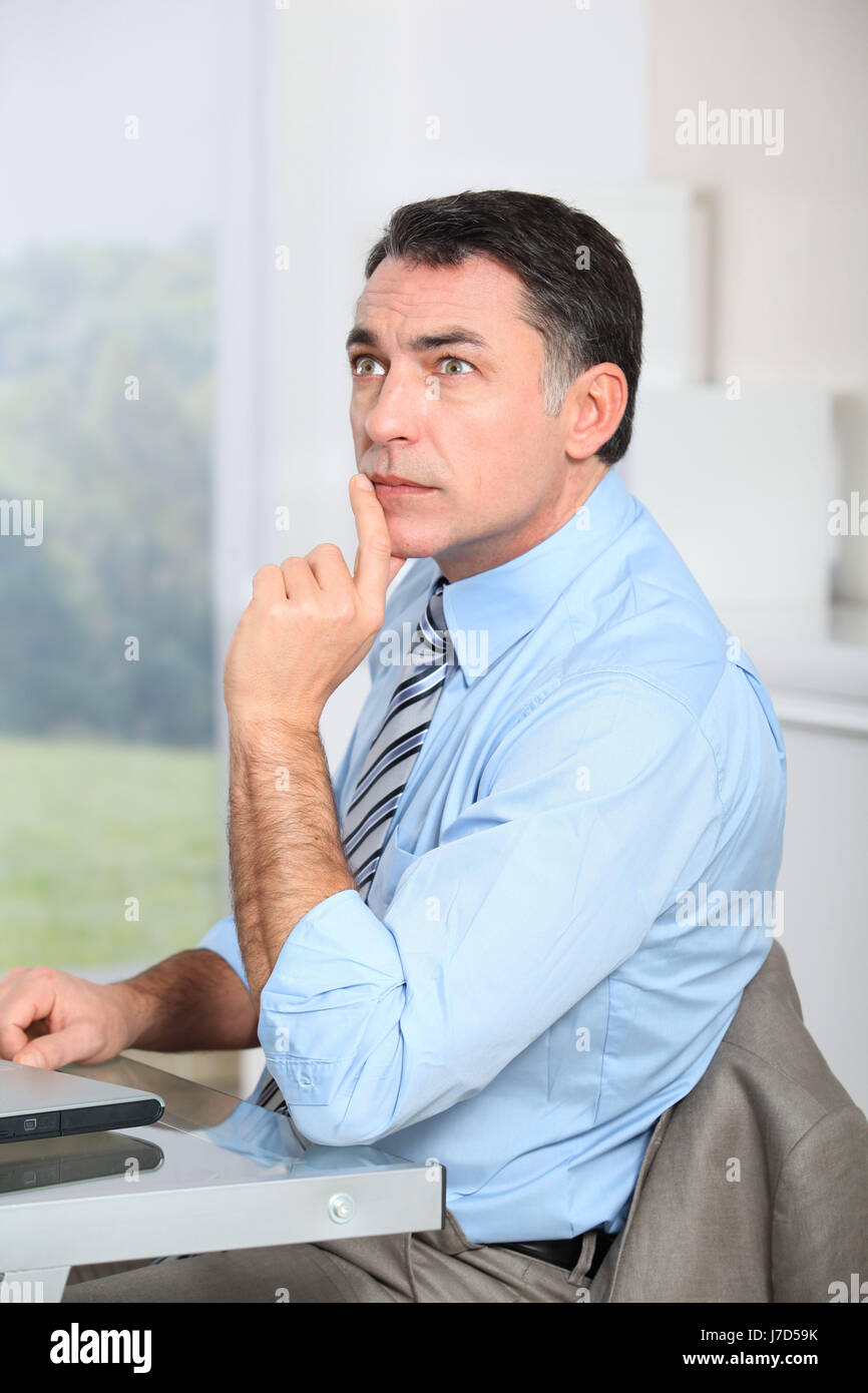 blue office laptop notebook computers computer desk closeup portrait ...