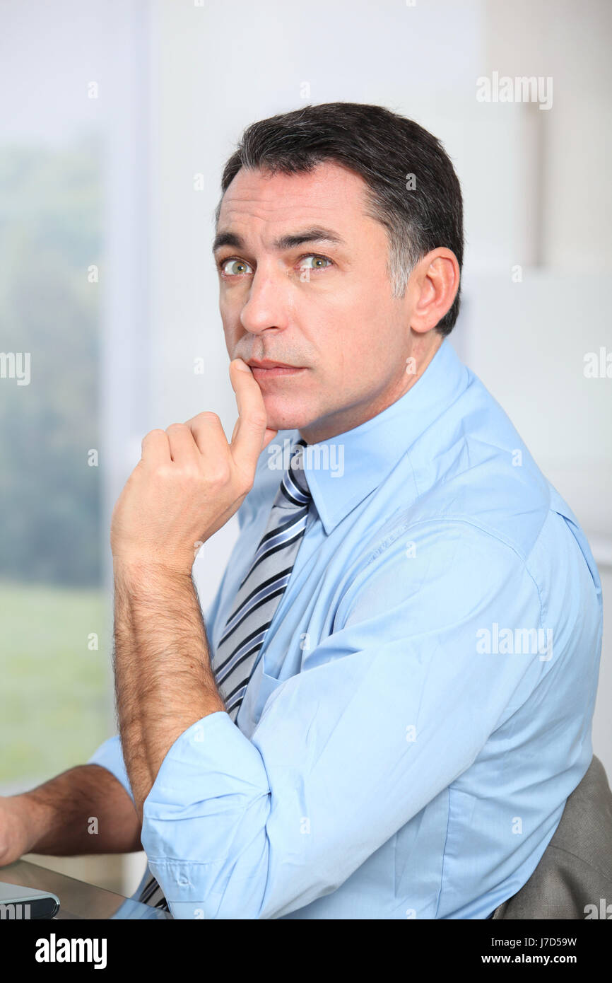 blue office laptop notebook computers computer desk closeup portrait ...