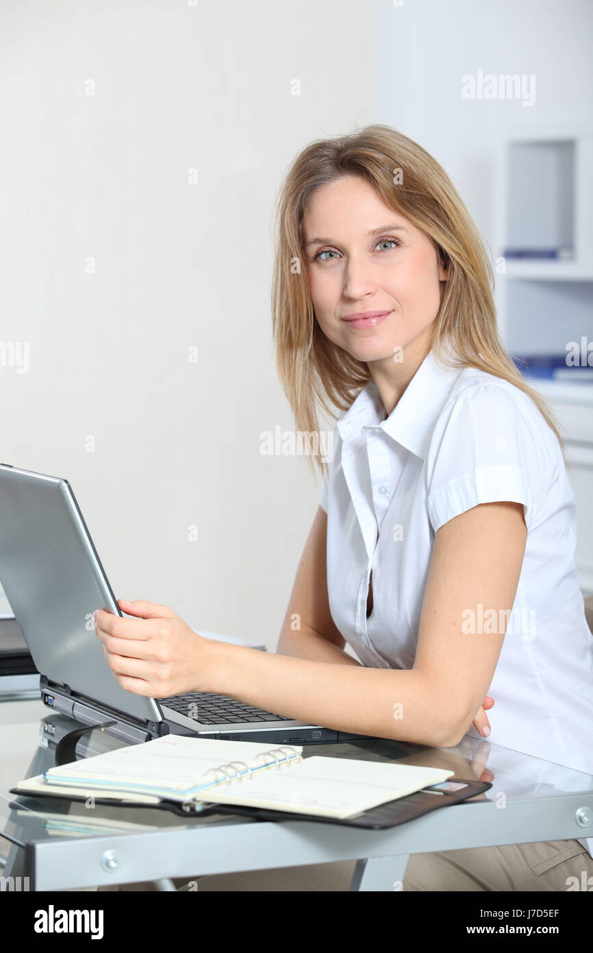 woman office laptop notebook computers computer laugh laughs laughing ...