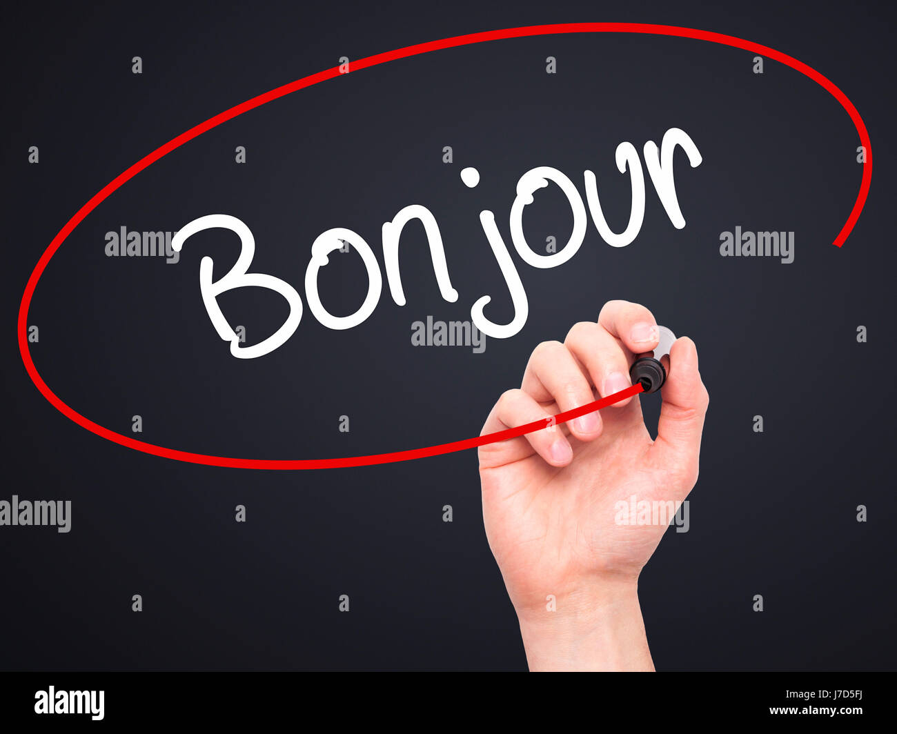Man Hand writing Bonjour (Good Morning in French) with black marker on ...