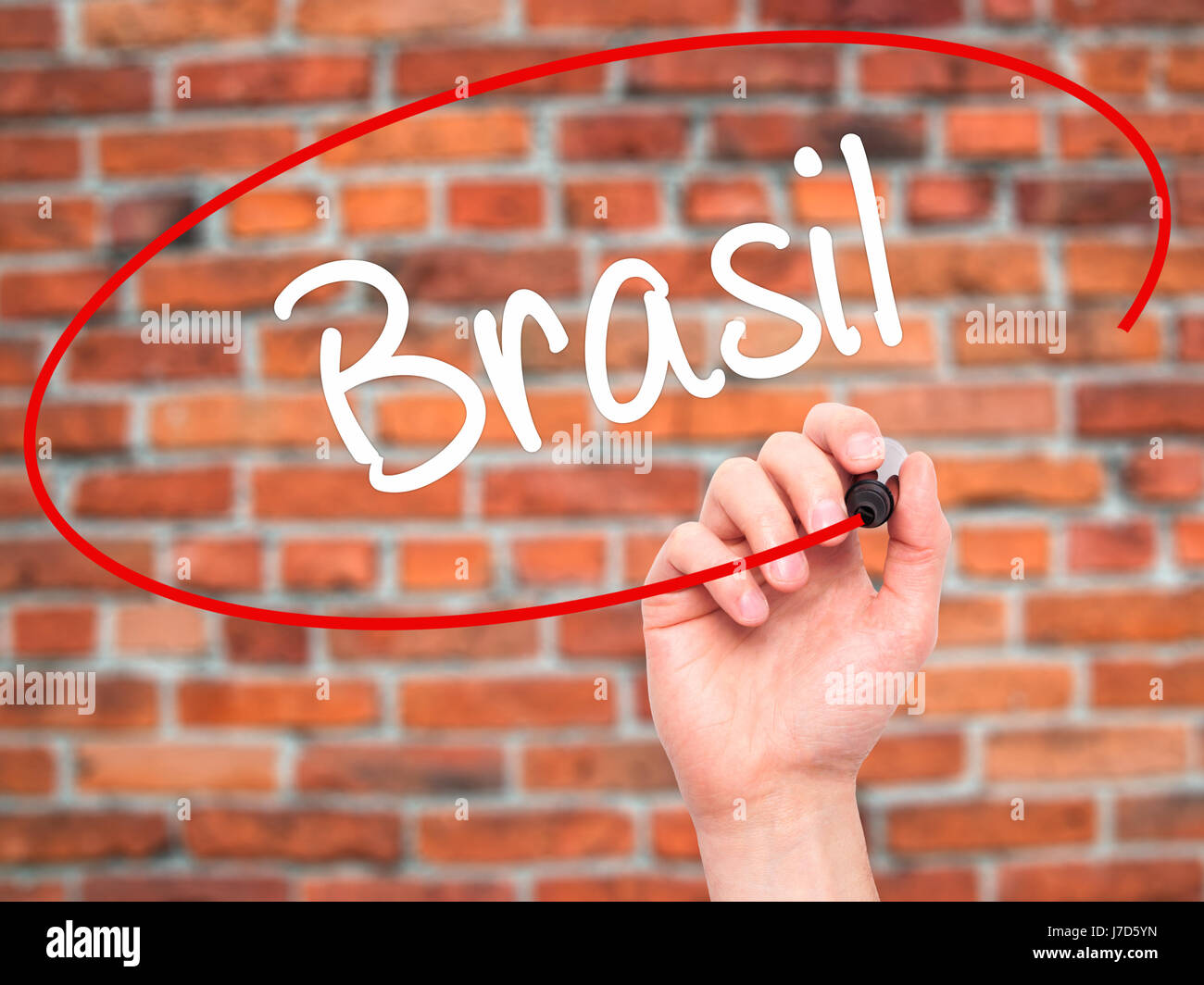 Man Hand writing Brasil ( Brazil in Portuguese) with black marker on ...