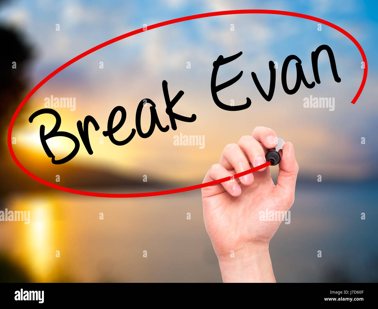 Man Hand writing Break Evan with black marker on visual screen ...