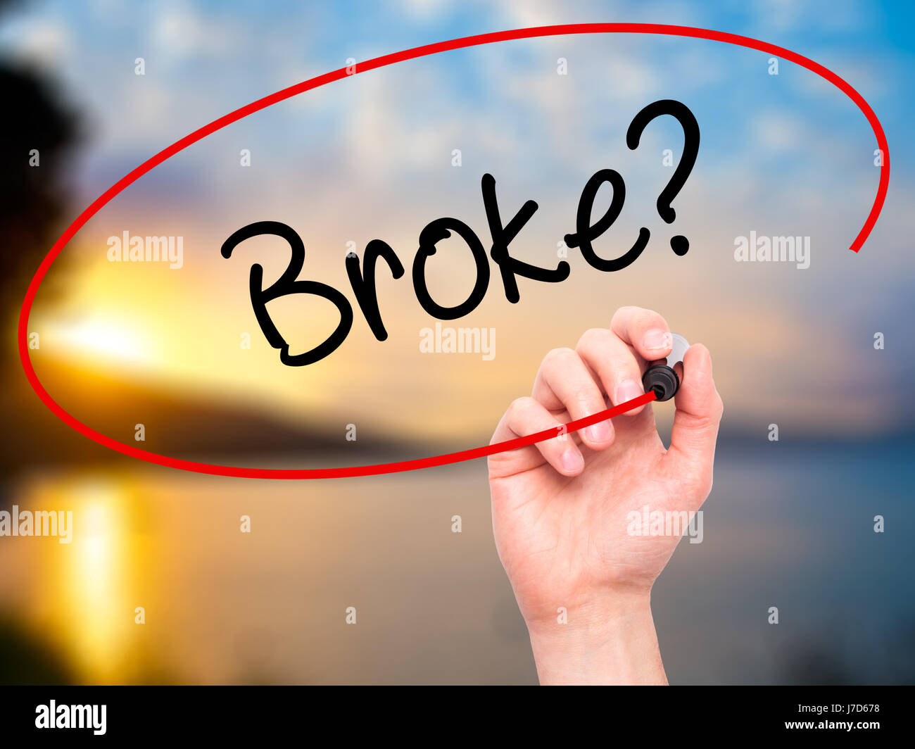 Man Hand writing Broke? with black marker on visual screen. Isolated on ...