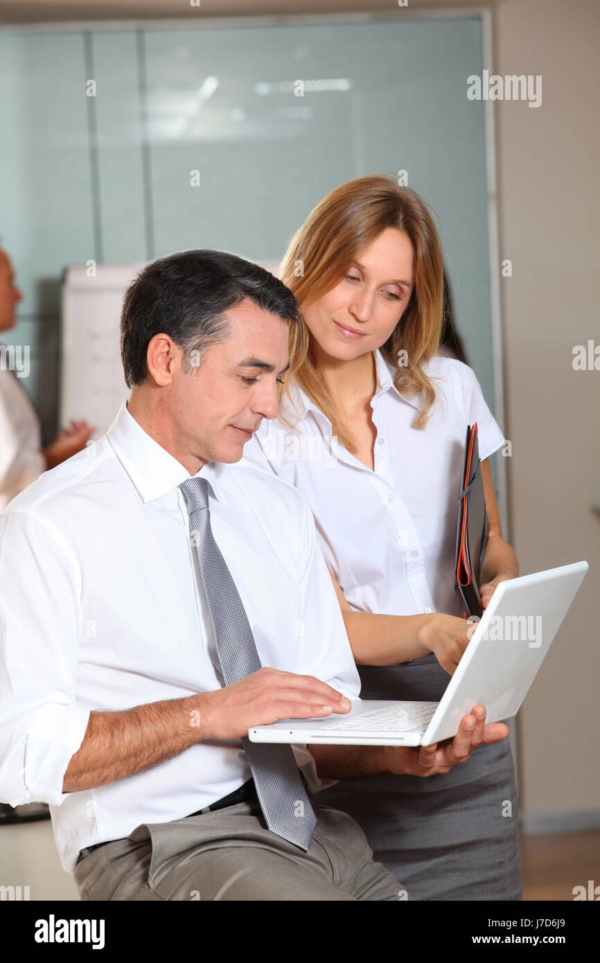 woman office laptop notebook computers computer discussion presentation ...