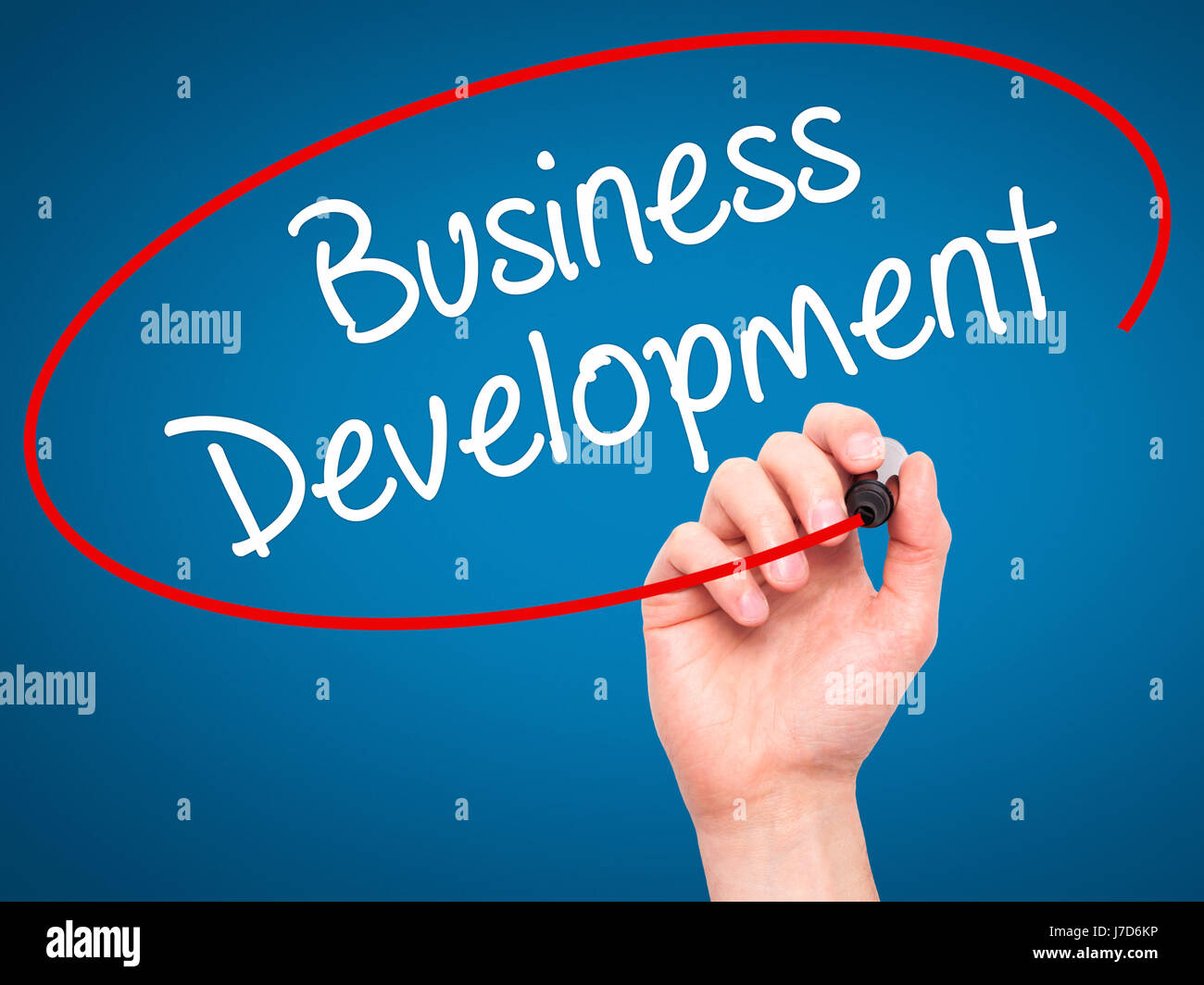 Man Hand writing Business Development with black marker on visual ...