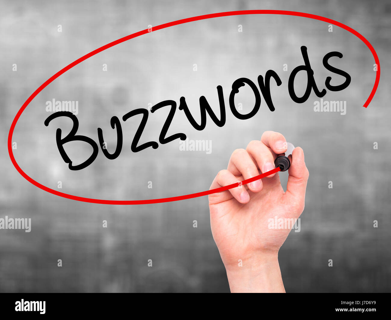 Man Hand writing Buzzwords with black marker on visual screen. Isolated ...