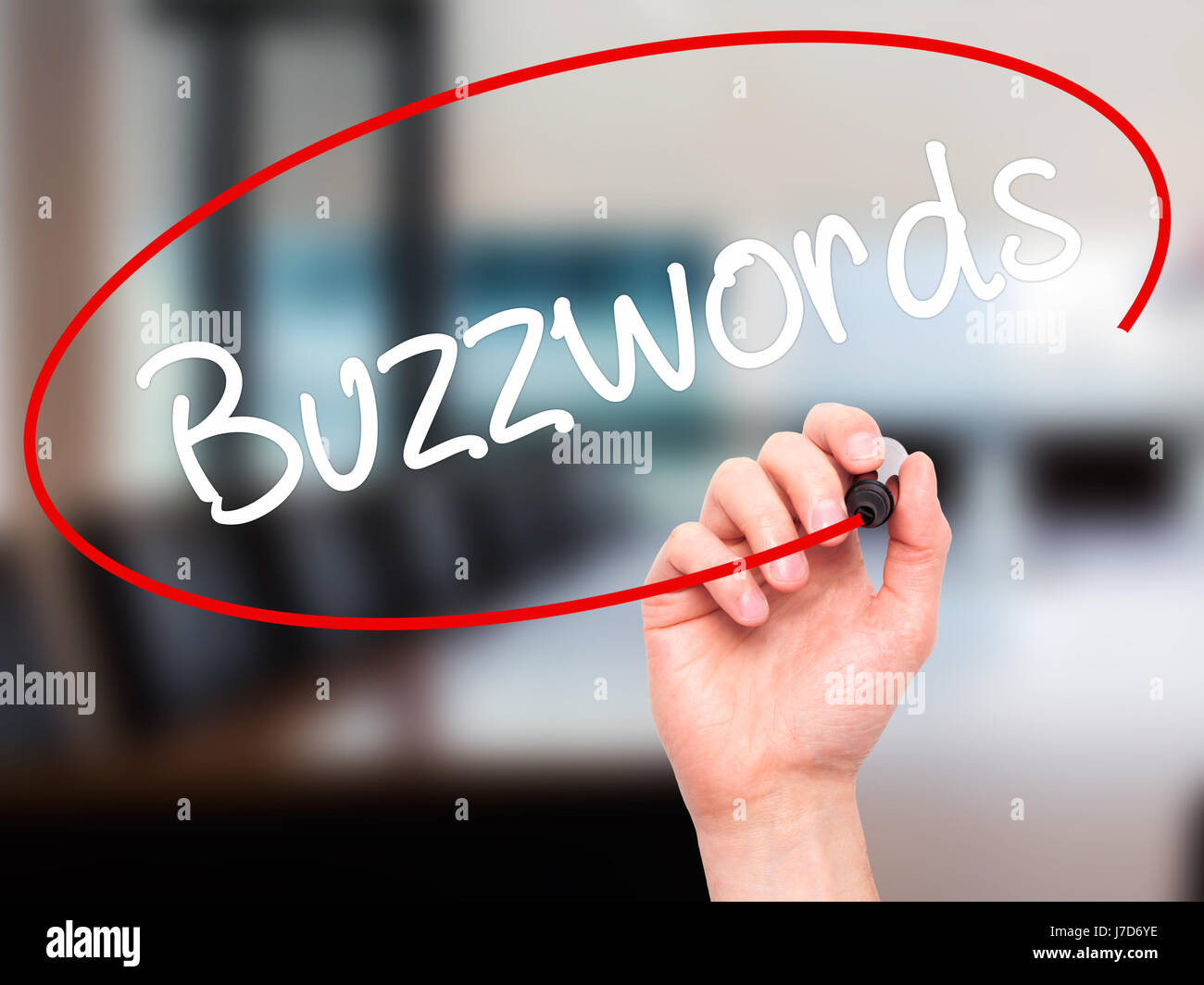 Man Hand writing Buzzwords with black marker on visual screen. Isolated ...