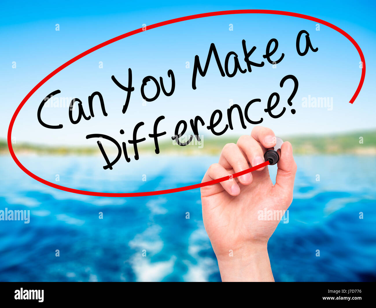 Man Hand writing Can You Make a Difference? with black marker on visual ...