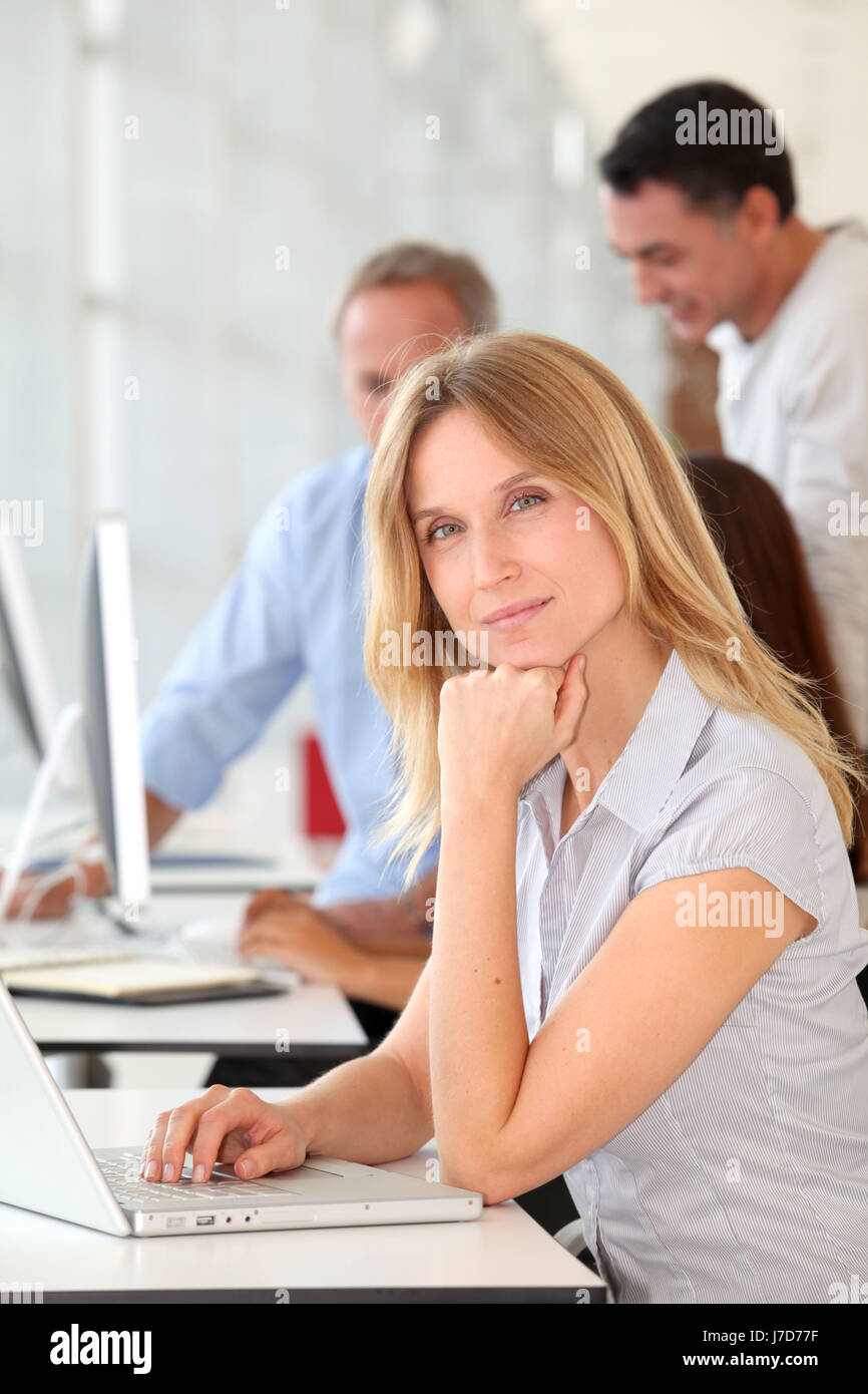 woman office laptop notebook computers computer laugh laughs laughing ...