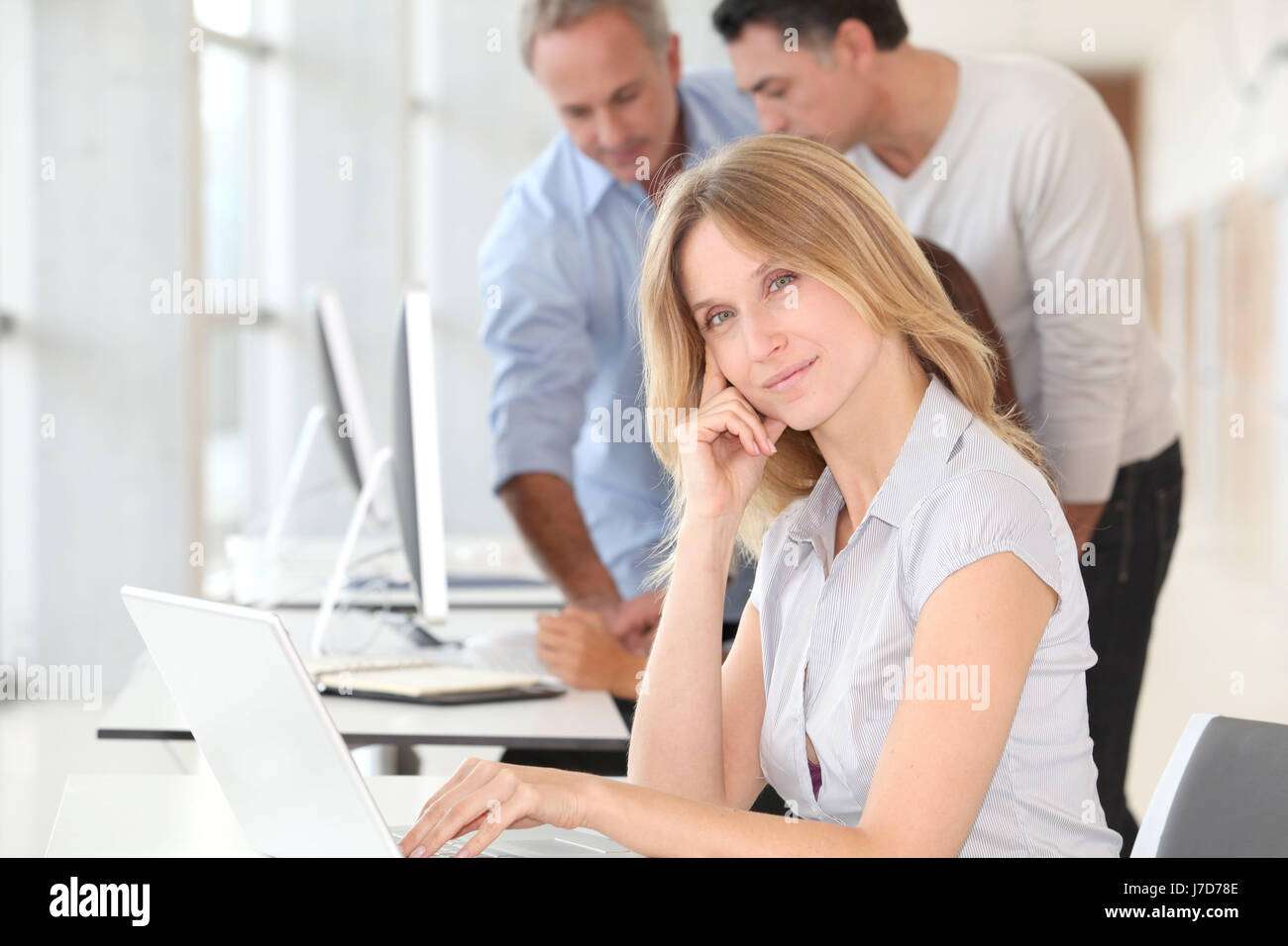 woman office laptop notebook computers computer laugh laughs laughing ...
