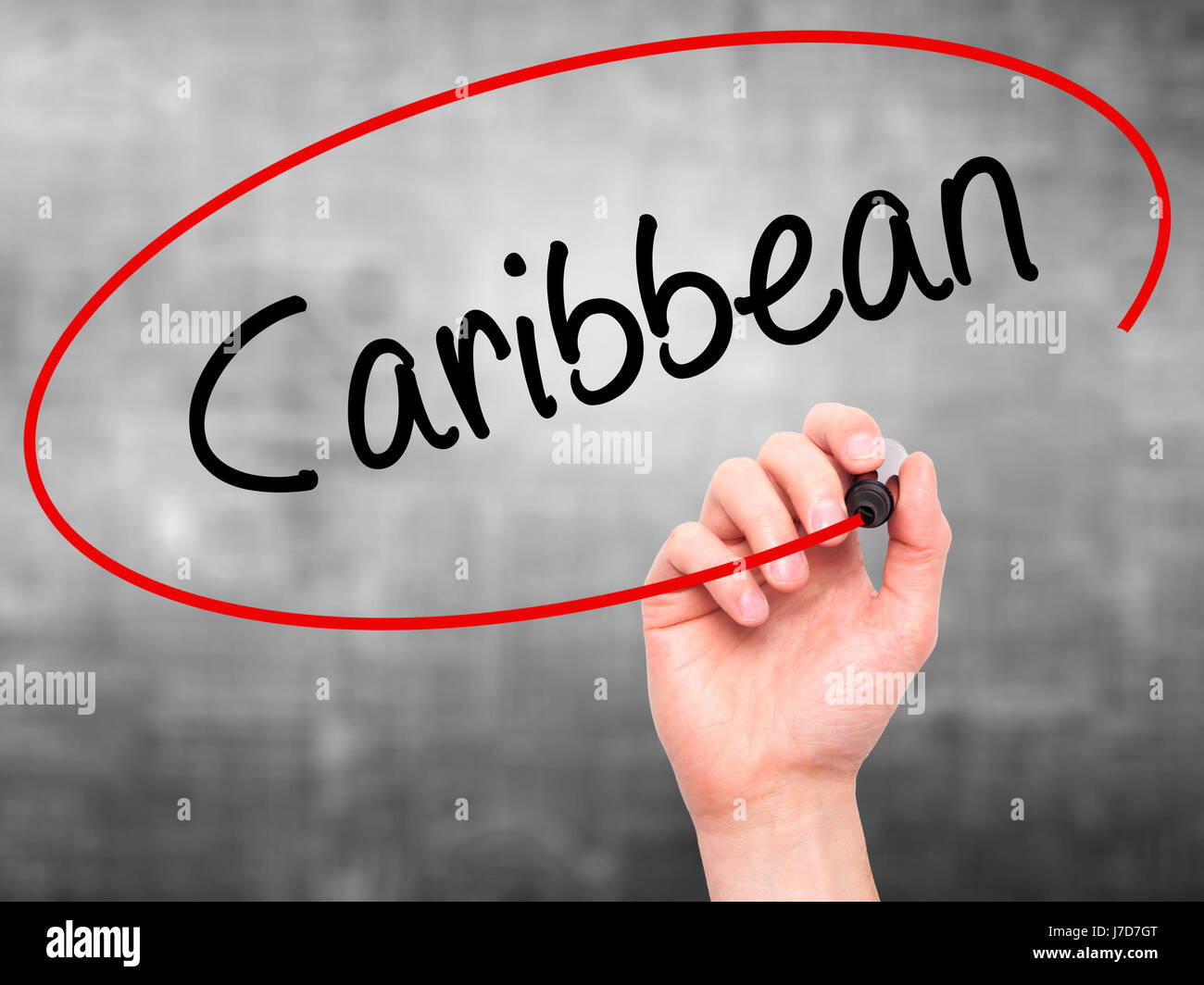 Man Hand writing Caribbean with black marker on visual screen. Isolated ...