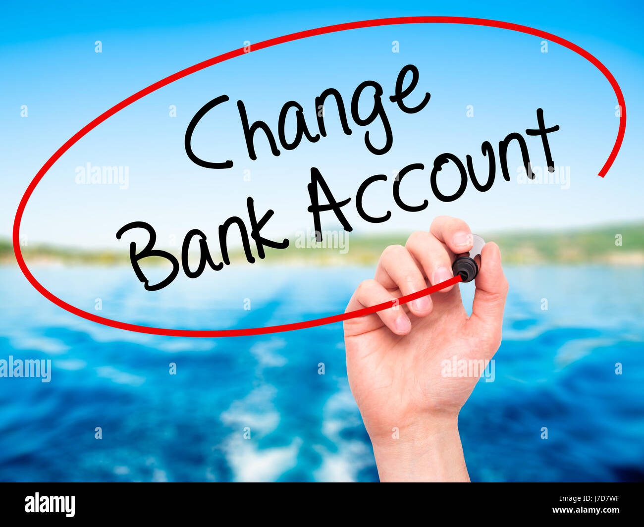 Man Hand writing Change Bank Account with black marker on visual screen ...