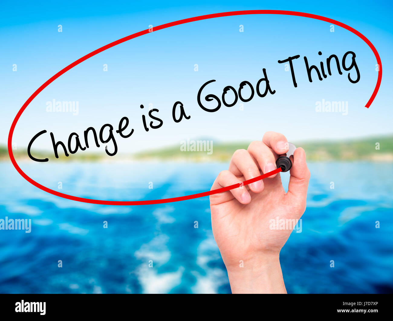 Man Hand writing Change is a Good Thing with black marker on visual ...