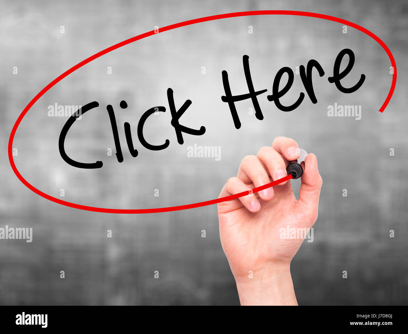 Man Hand writing Click Here with black marker on visual screen ...