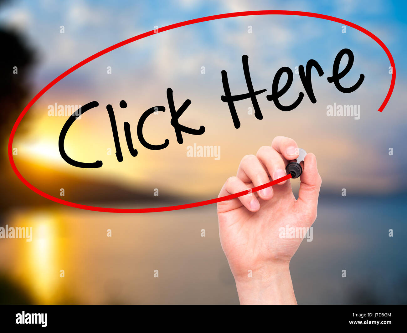 Man Hand writing Click Here with black marker on visual screen ...