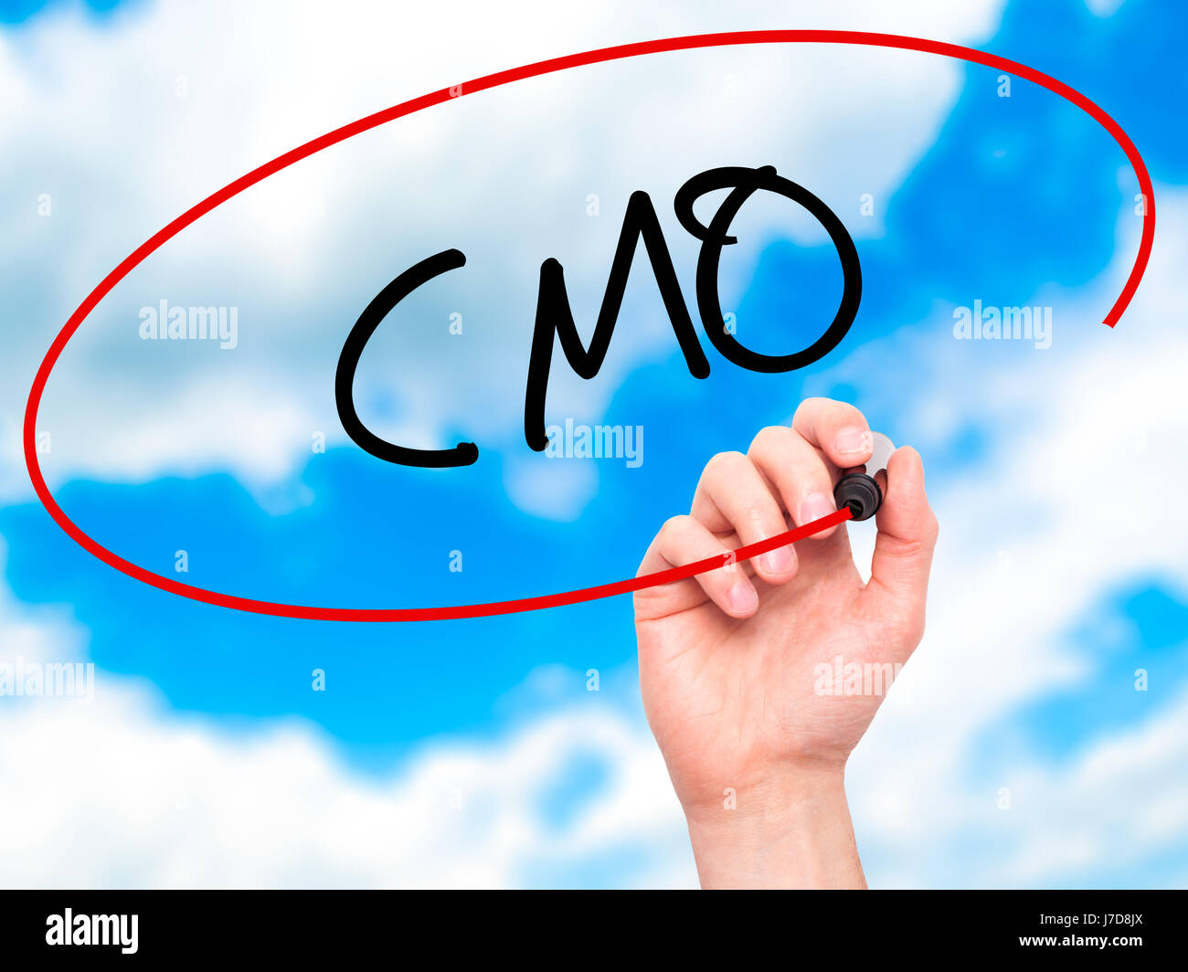 Man Hand writing CMO (Chief Marketing Officer) with black marker on ...