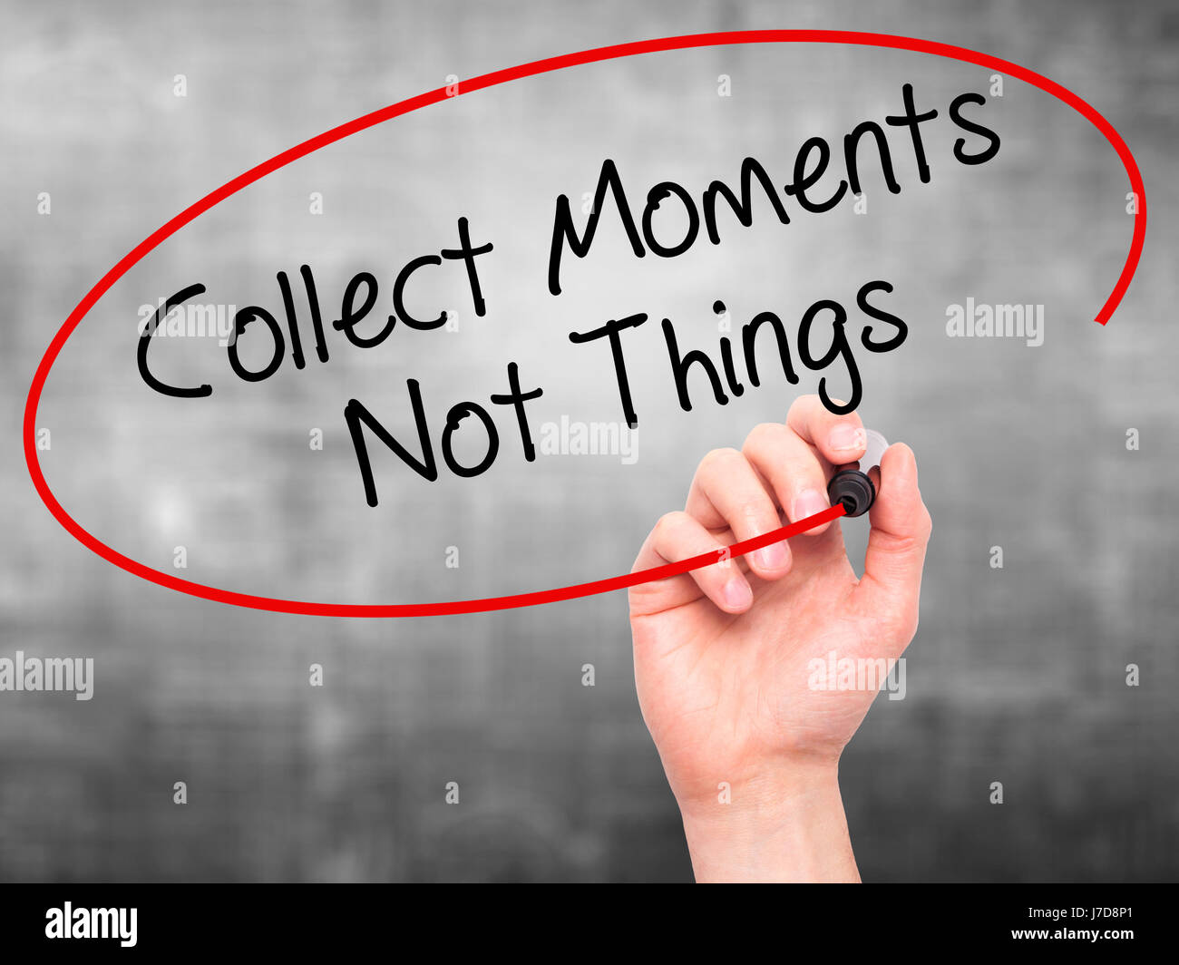 Man Hand writing Collect Moments Not Things with black marker on visual ...