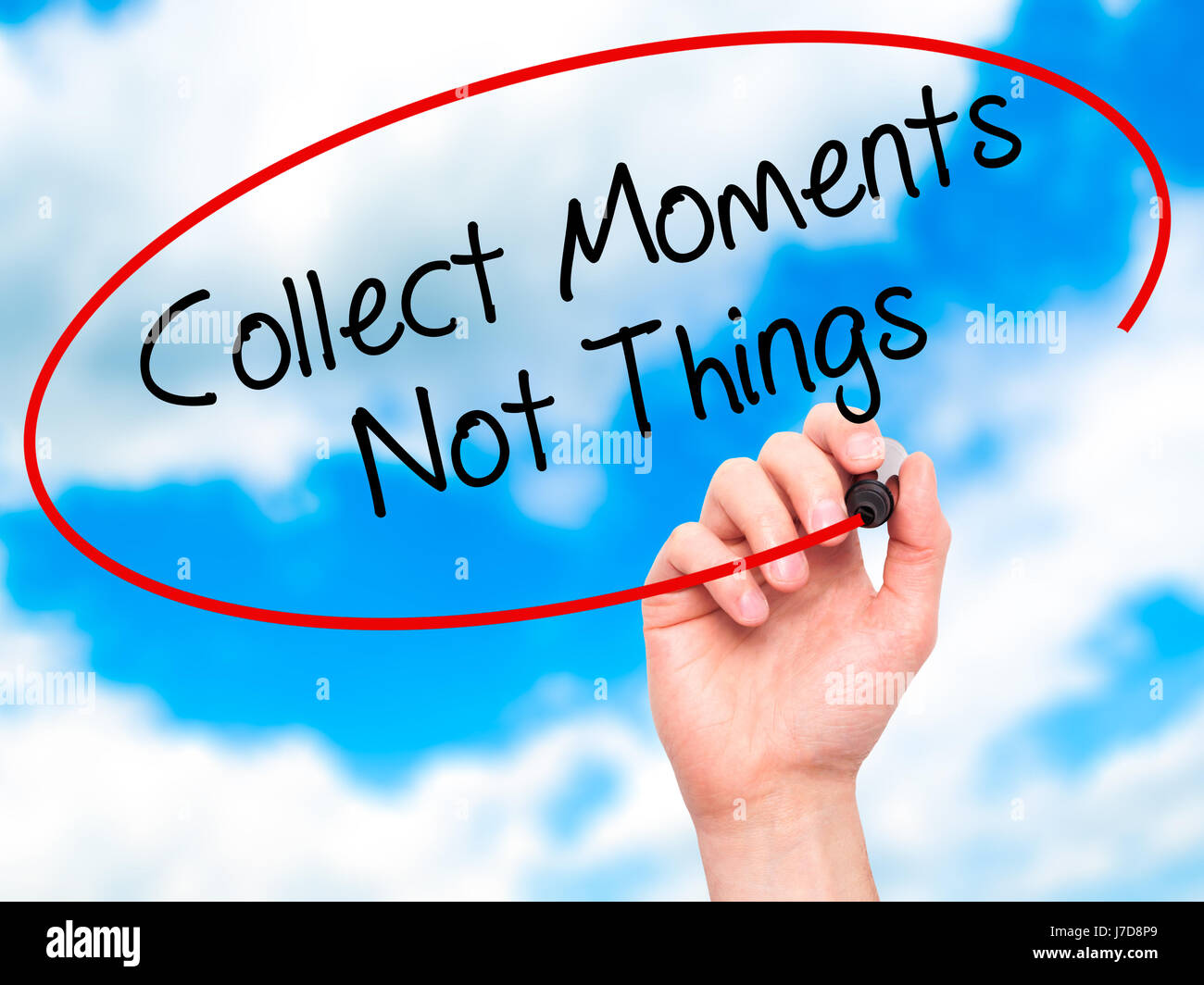 Man Hand writing Collect Moments Not Things with black marker on visual ...