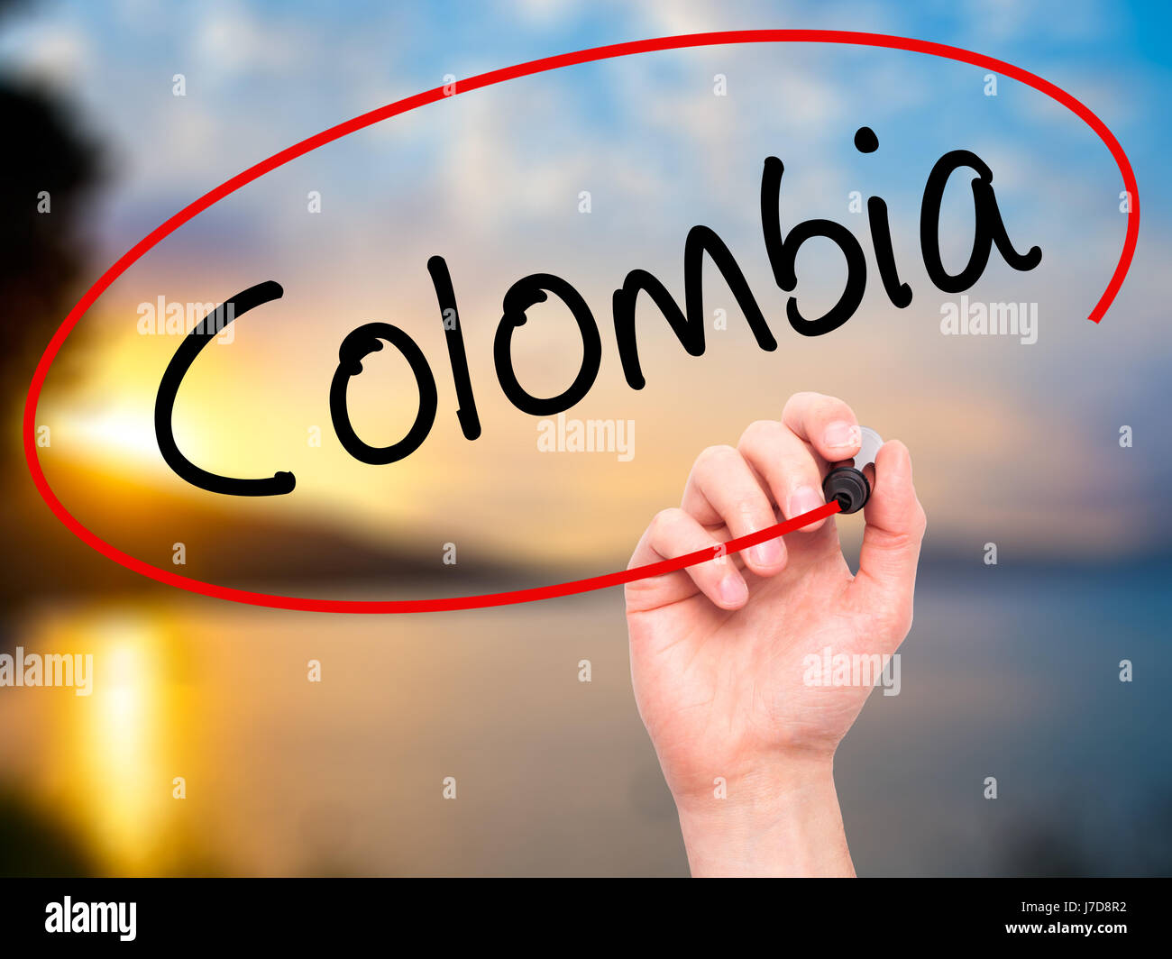 Man Hand writing Colombia with black marker on visual screen. Isolated ...