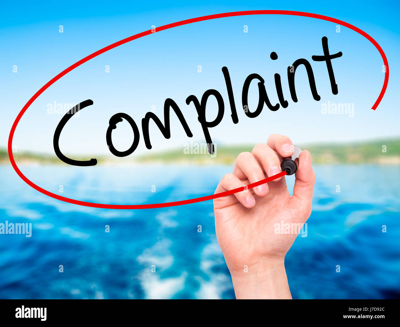 Man Hand writing Complaint with black marker on visual screen. Isolated ...