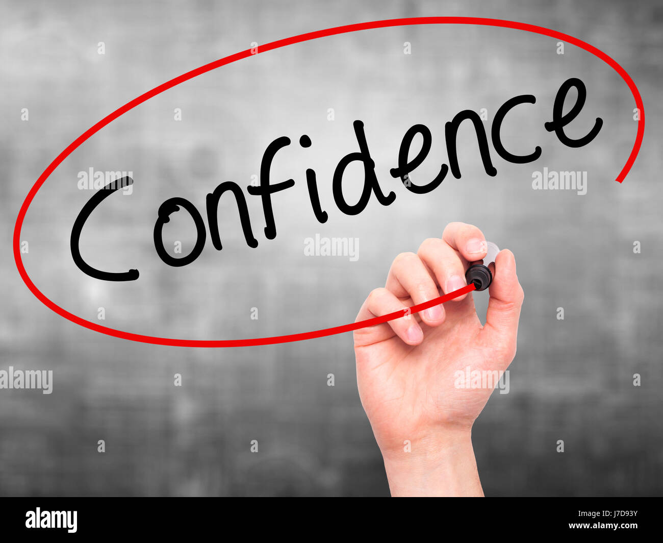 Man Hand writing Confidence with black marker on visual screen ...