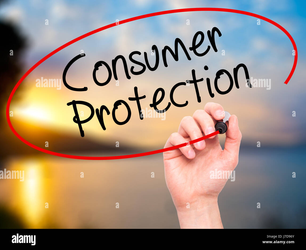 Man Hand writing Consumer Protection with black marker on visual screen ...