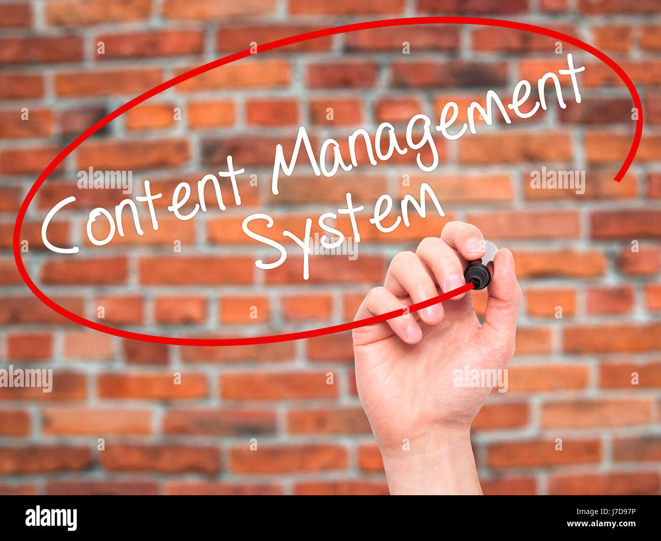 Man Hand writing Content Management System with black marker on visual ...
