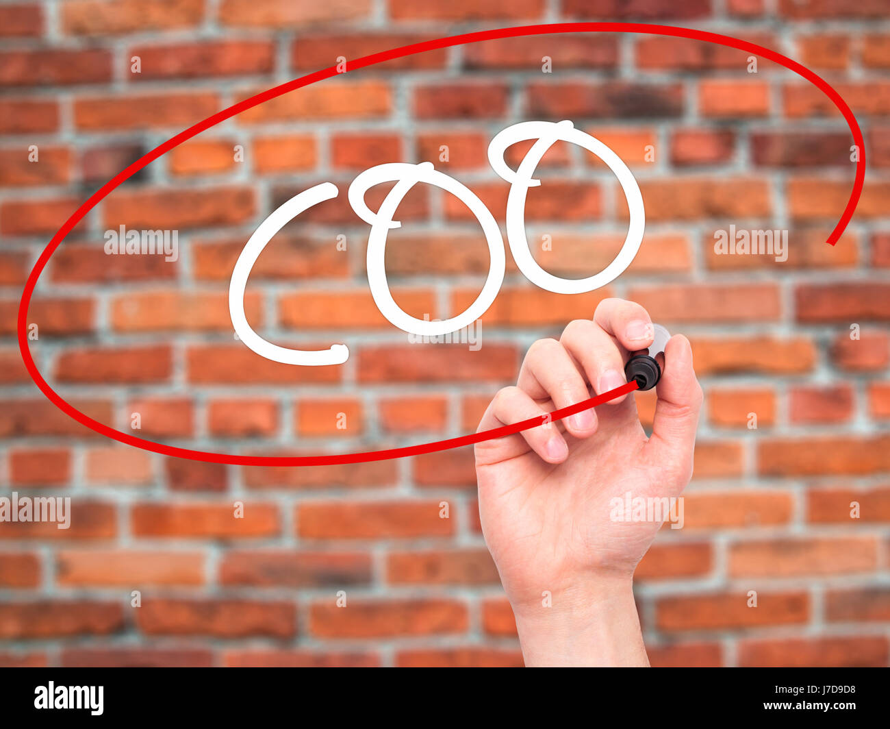 Man Hand writing COO (Chief Operating Officer) with black marker on ...