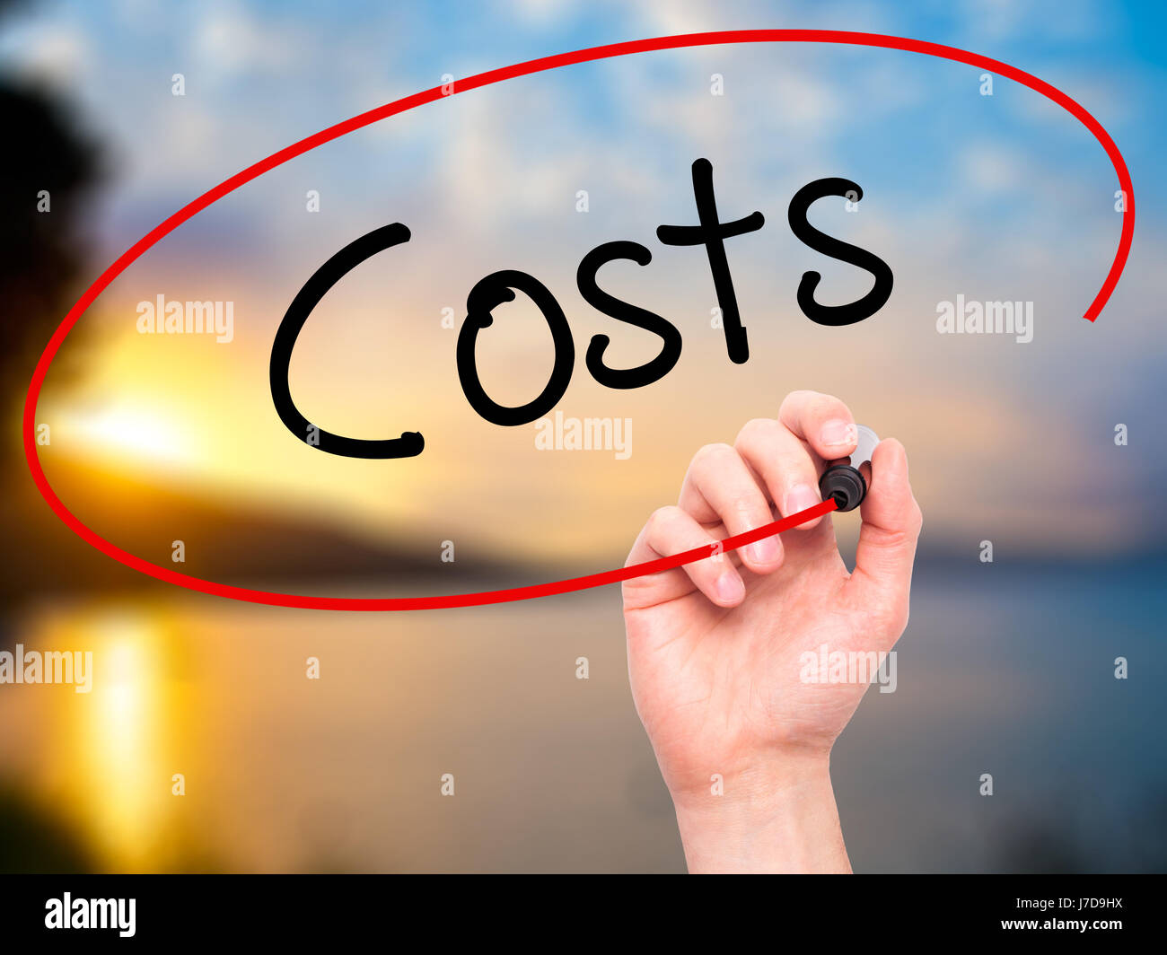 Man Hand writing Costs with black marker on visual screen. Isolated on ...