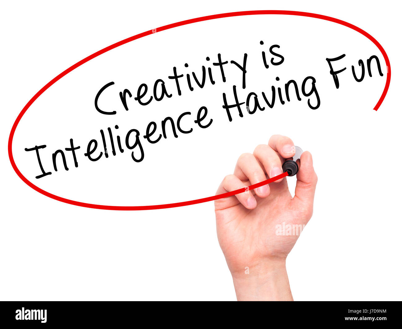 Man Hand writing Creativity is Intelligence Having Fun with black ...