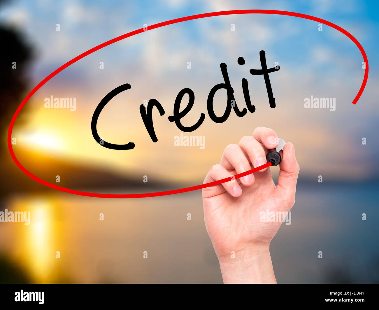 Man Hand writing Credit with black marker on visual screen. Isolated on ...