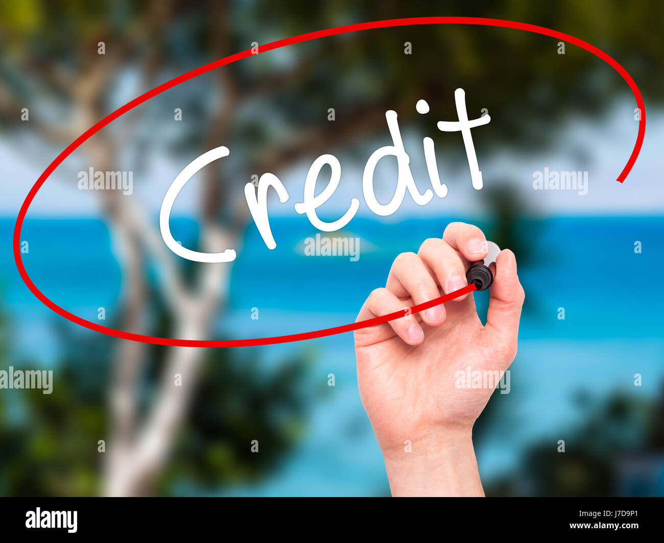 Man Hand writing Credit with black marker on visual screen. Isolated on ...