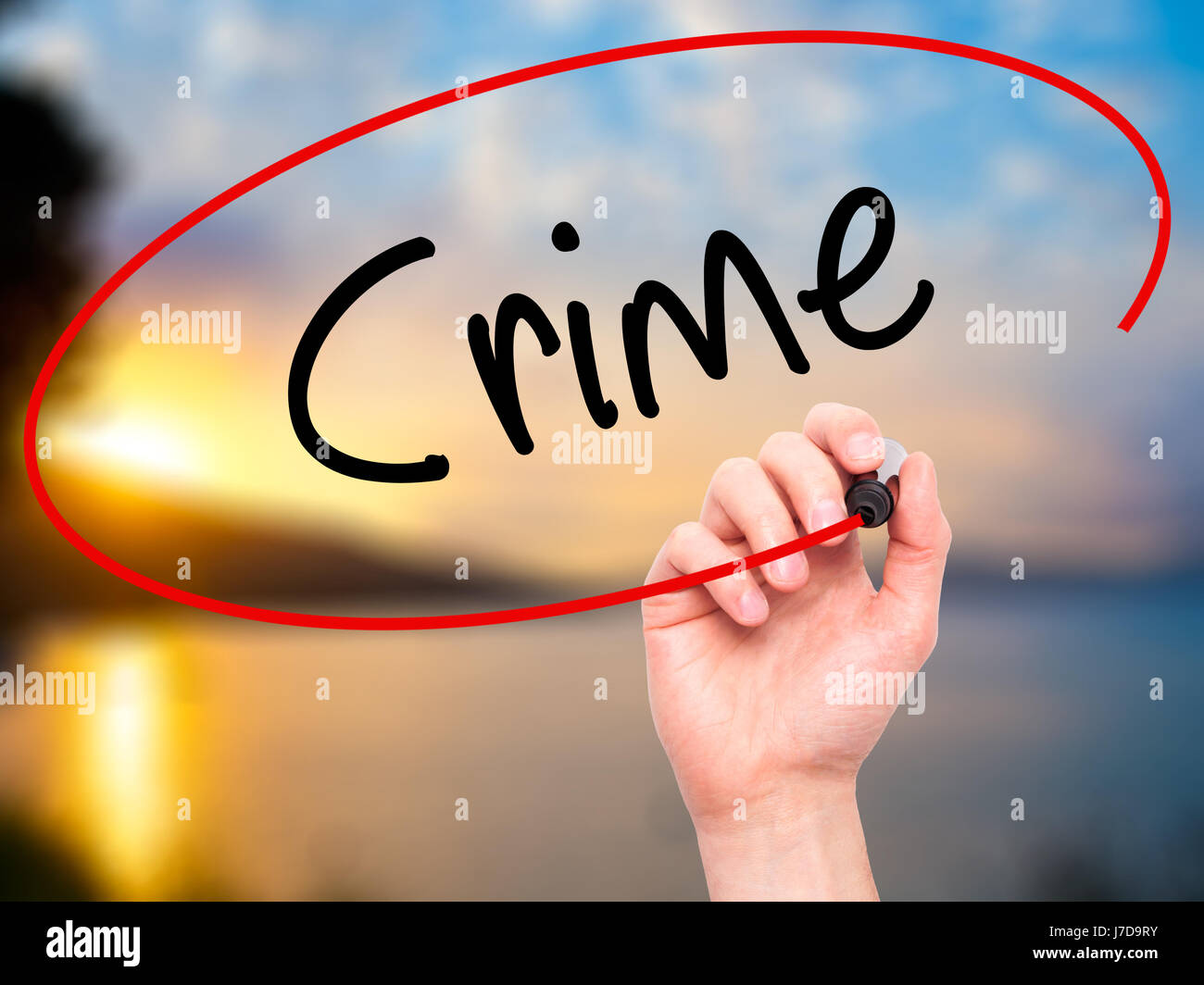 Man Hand writing Crime with black marker on visual screen. Isolated on ...