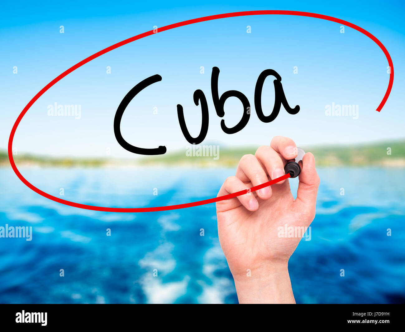 Man Hand writing Cuba with black marker on visual screen. Isolated on ...