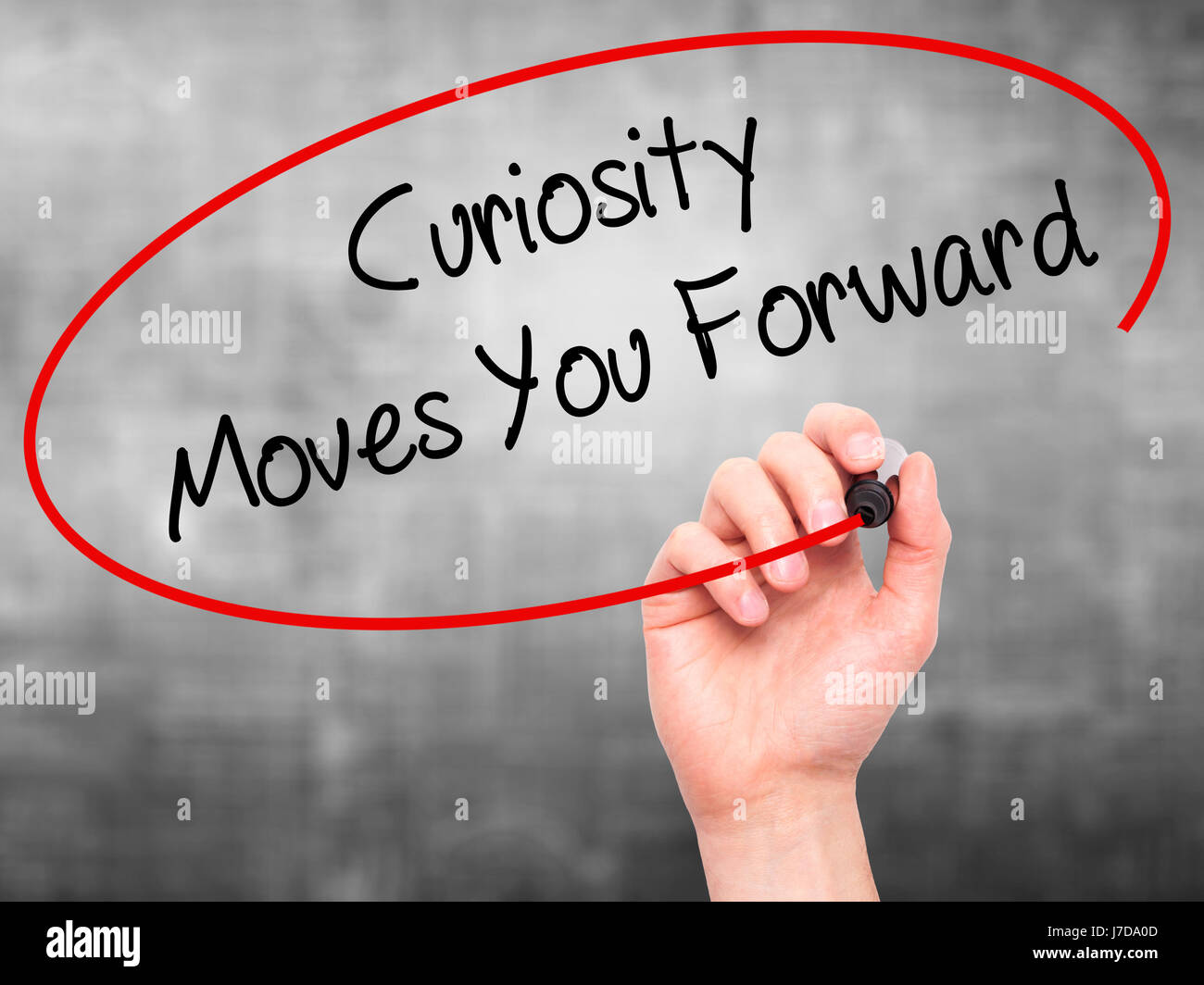 Man Hand writing Curiosity Moves You Forward with black marker on ...