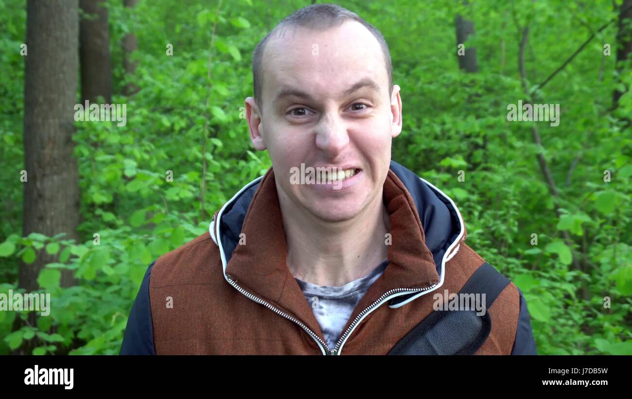 an evil man very angry,looking at the camera Stock Photo - Alamy