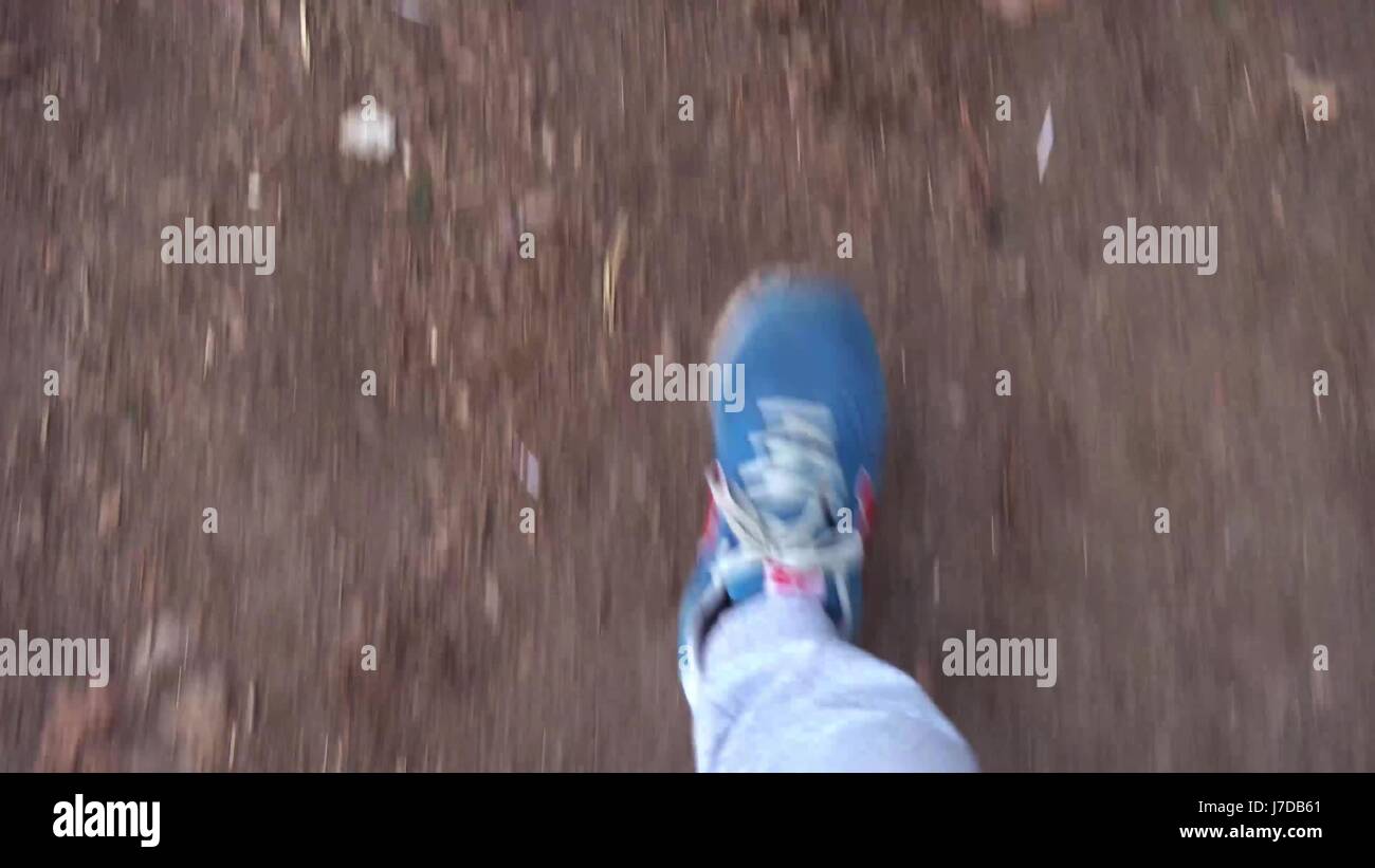 medium shot of feet walking man. First-Person mod Stock Photo - Alamy