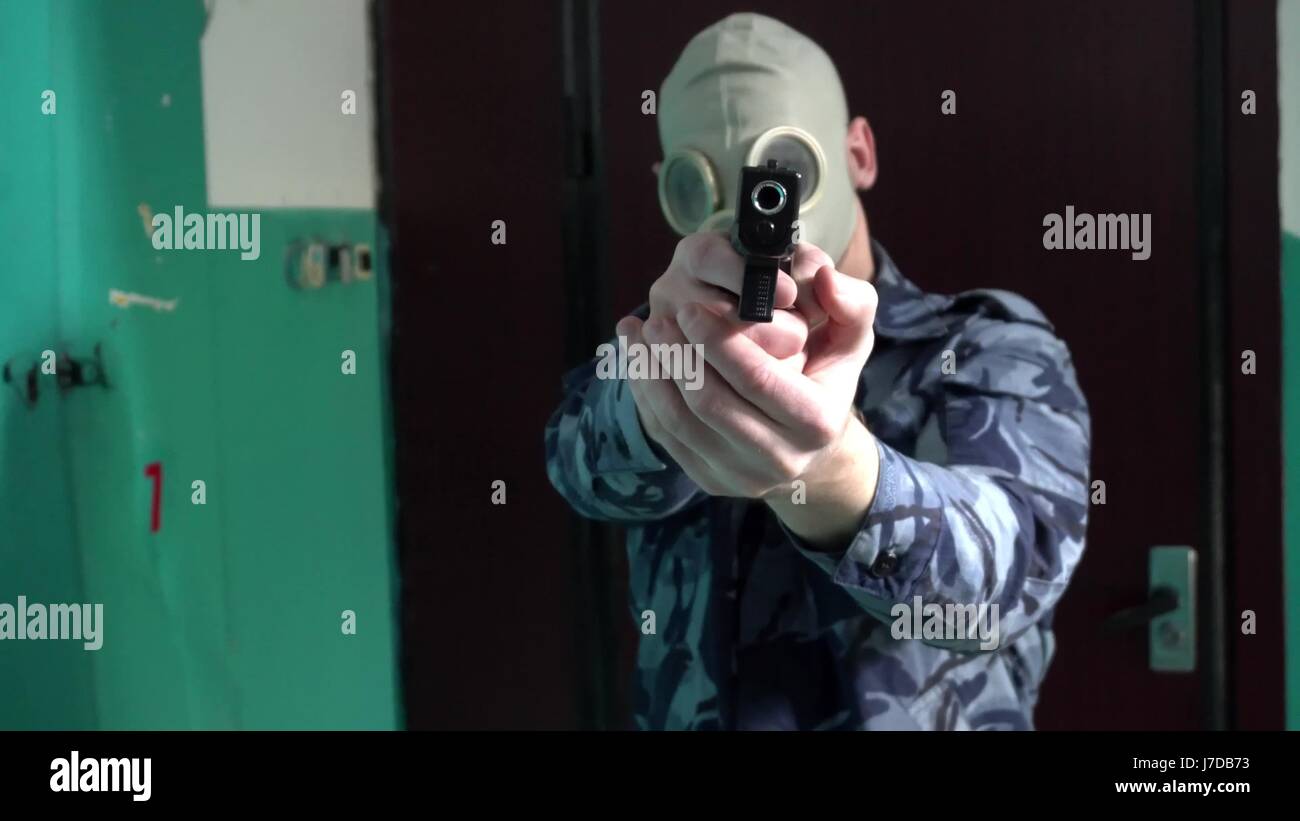 The guard, dressed in military uniform in the mask does not pass the ...